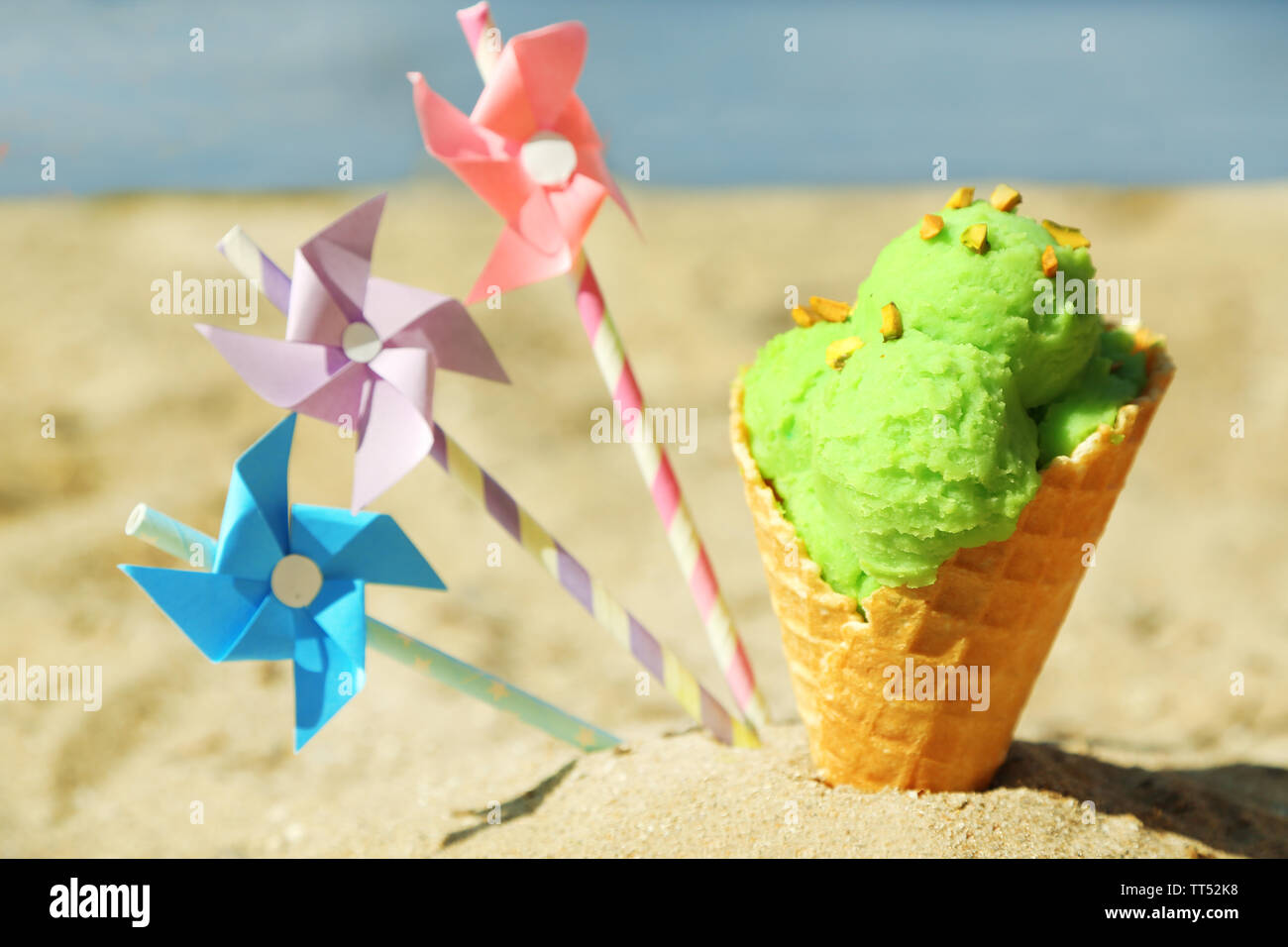 Ice cream in sand on beach Stock Photo - Alamy