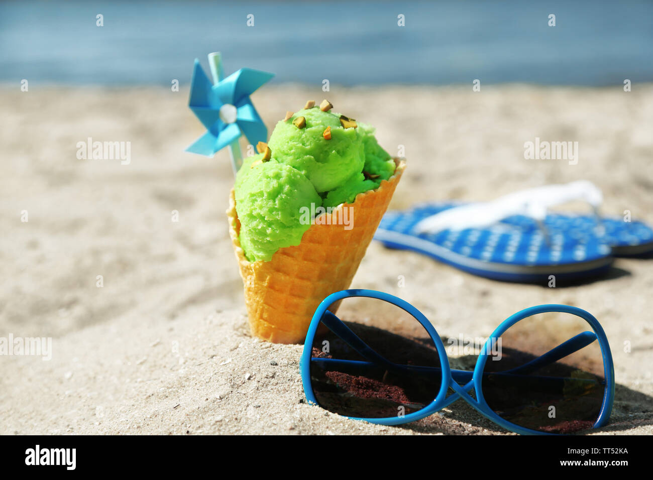 Ice cream in sand on beach Stock Photo - Alamy