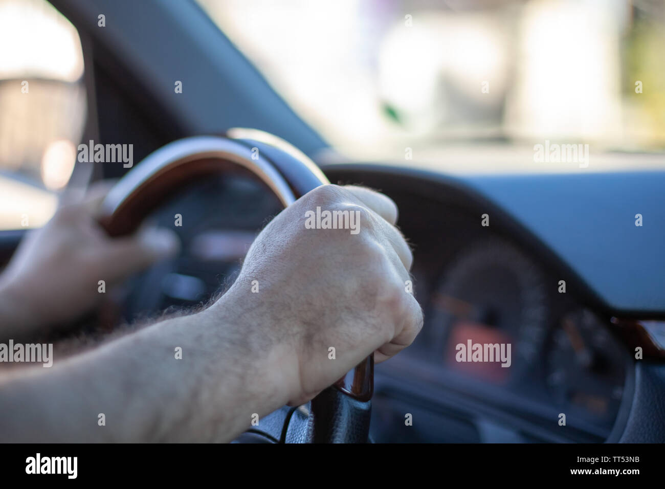 Mens hand on wheel trip hi-res stock photography and images - Alamy