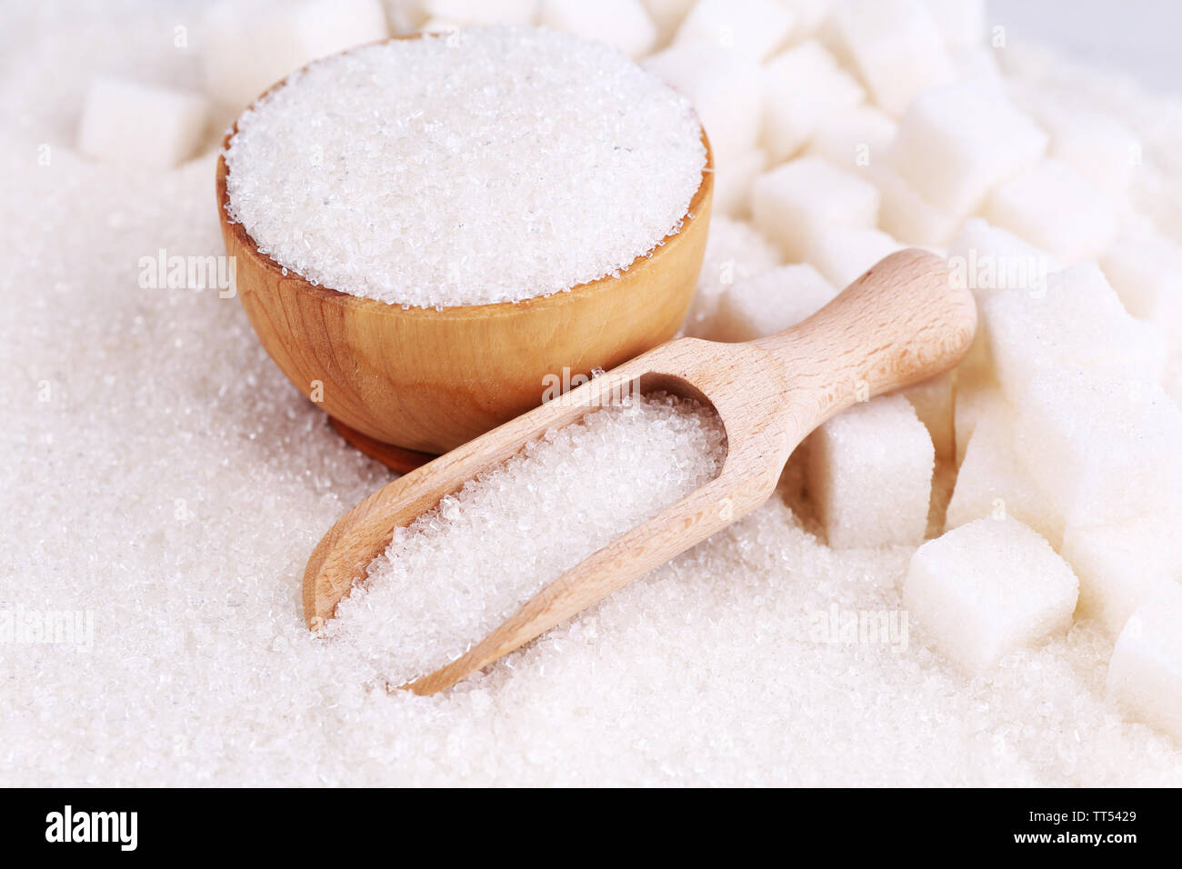 White sugar in light background background Stock Photo - Alamy