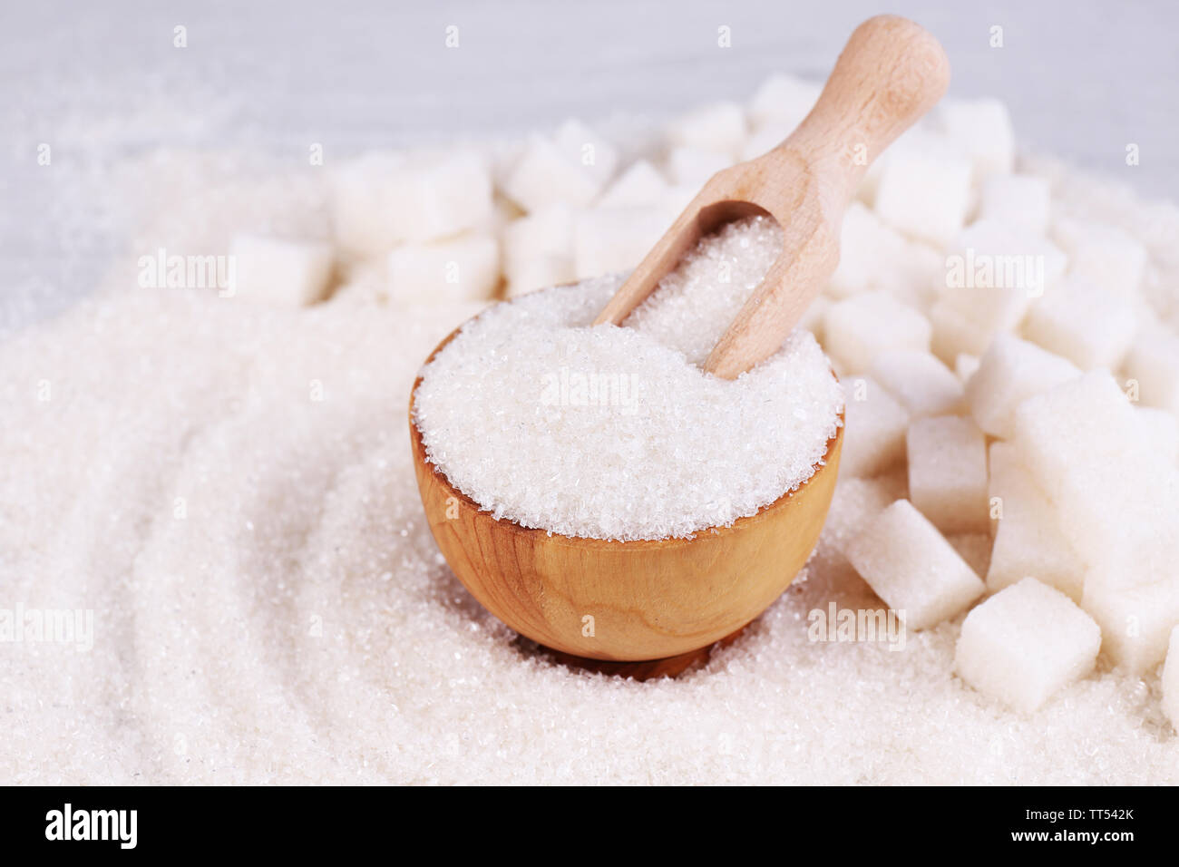 White sugar in light background background Stock Photo - Alamy