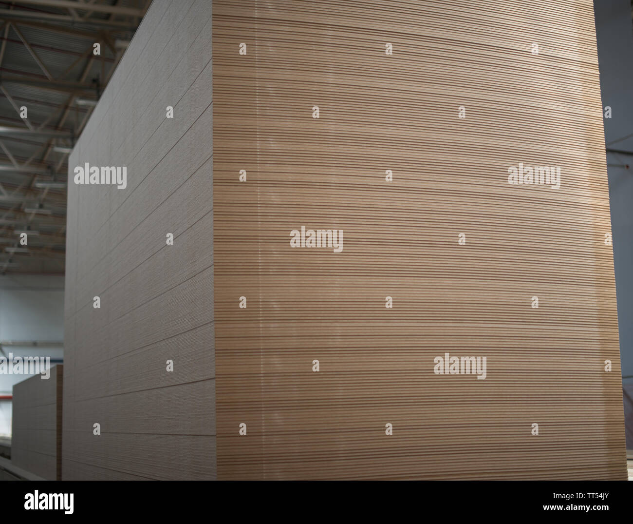 Big stack of MDF boards. Medium Density Fibreboard Stock Photo - Alamy
