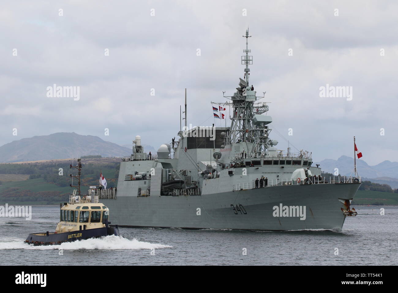 The Canadian Navy frigate HMCS St John's (FFH-340), being escorted by ...