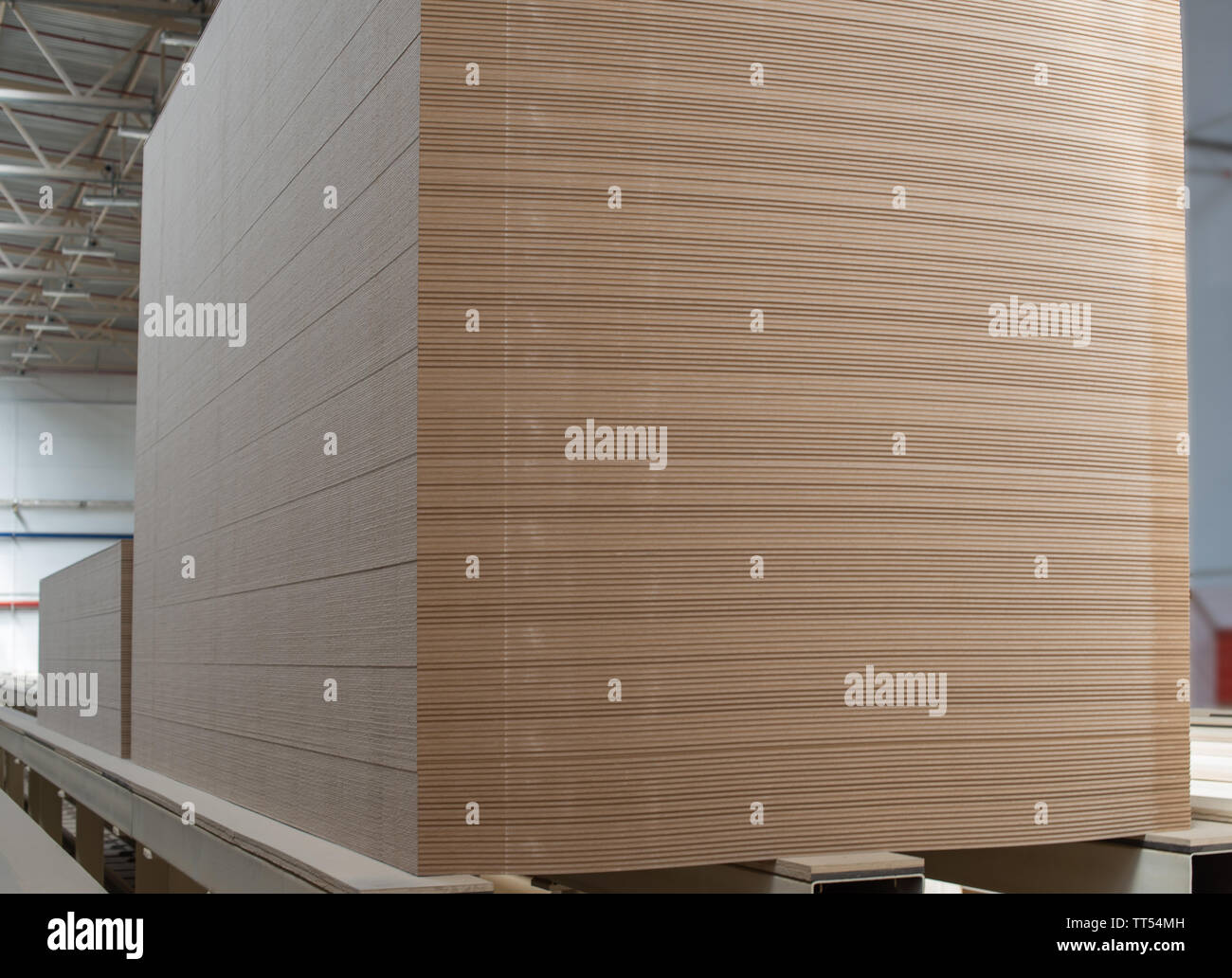 Big stack of MDF boards. Medium Density Fibreboard Stock Photo - Alamy