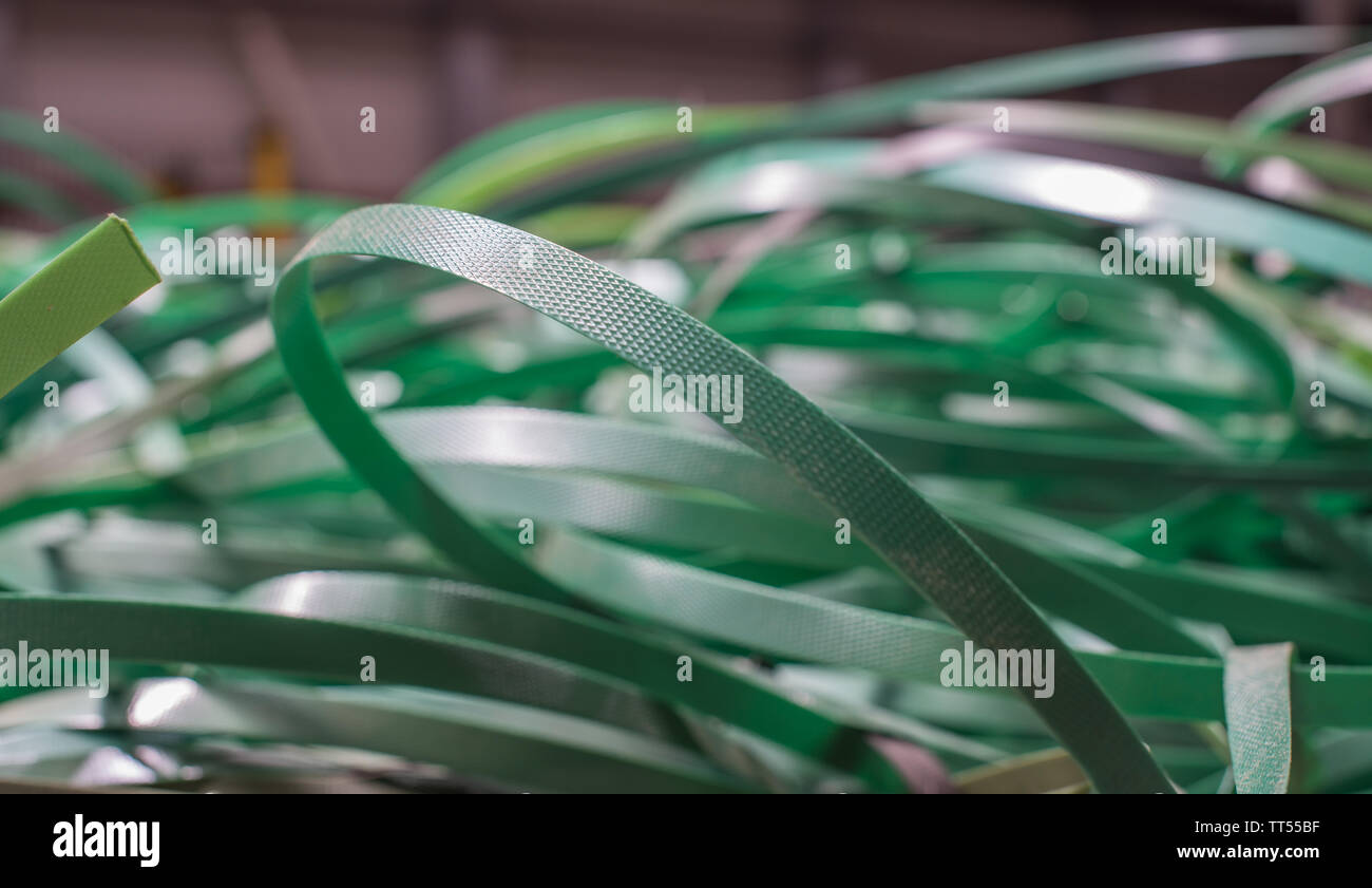 Waste green plastic packaging tape Stock Photo - Alamy