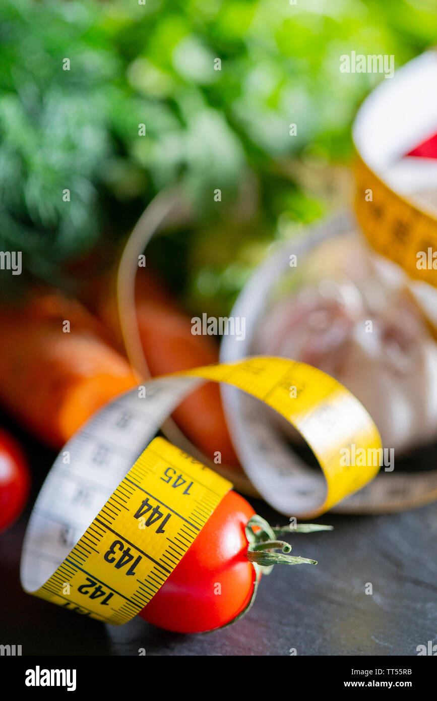 Measuring tape for measuring the circumference. Vegetables for diet ...