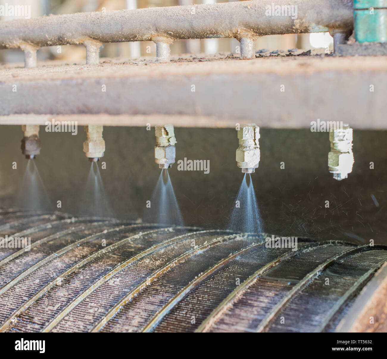 The injectors spray water on the contaminated drum Stock Photo - Alamy