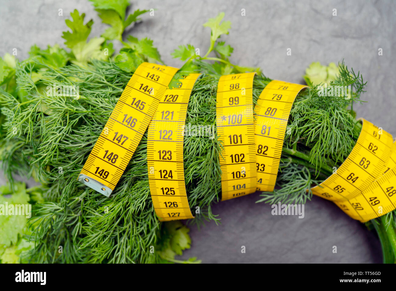 Measuring tape for measuring the circumference. Vegetables for diet ...