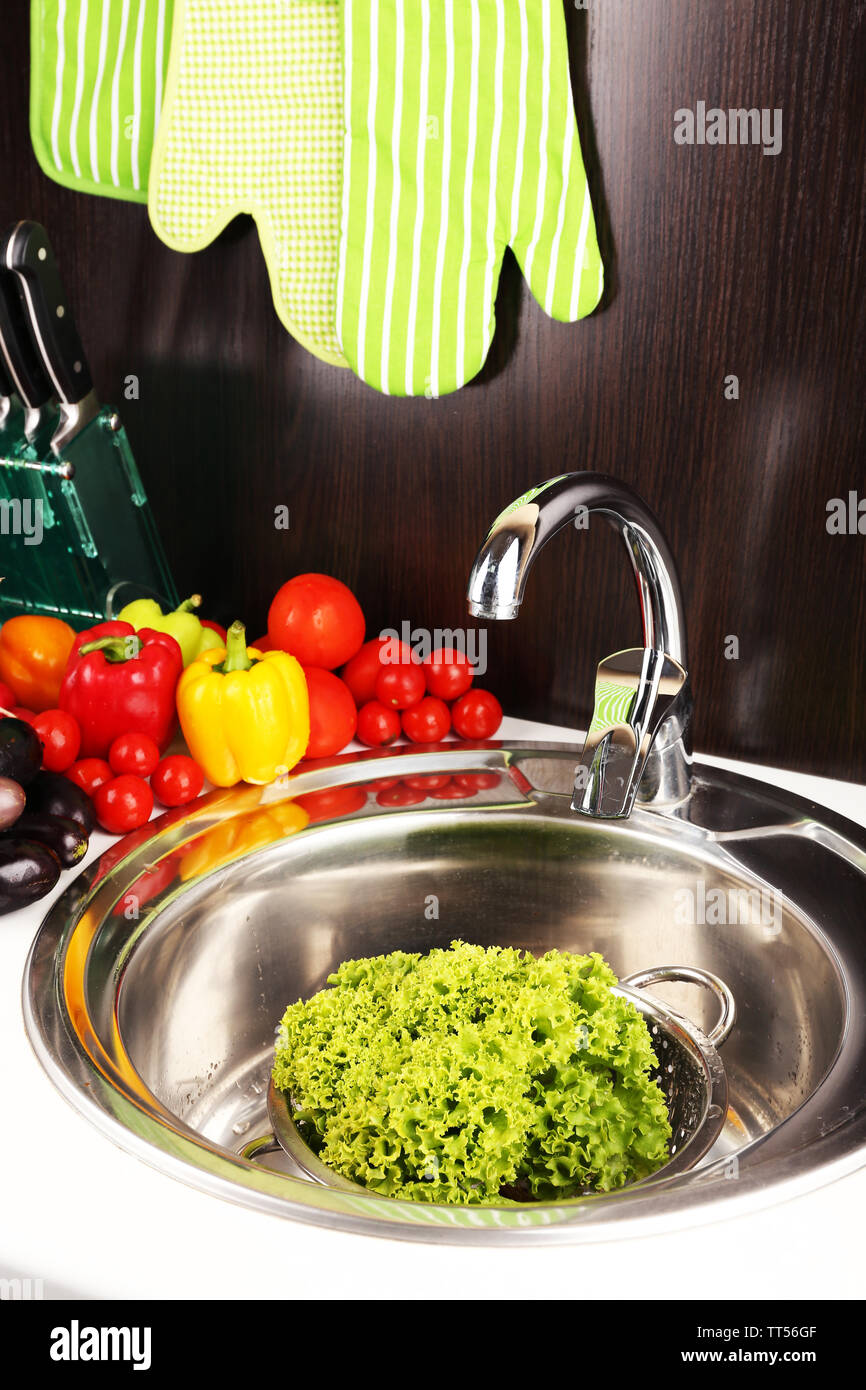 Fresh vegetables in sink in kitchen Stock Photo - Alamy