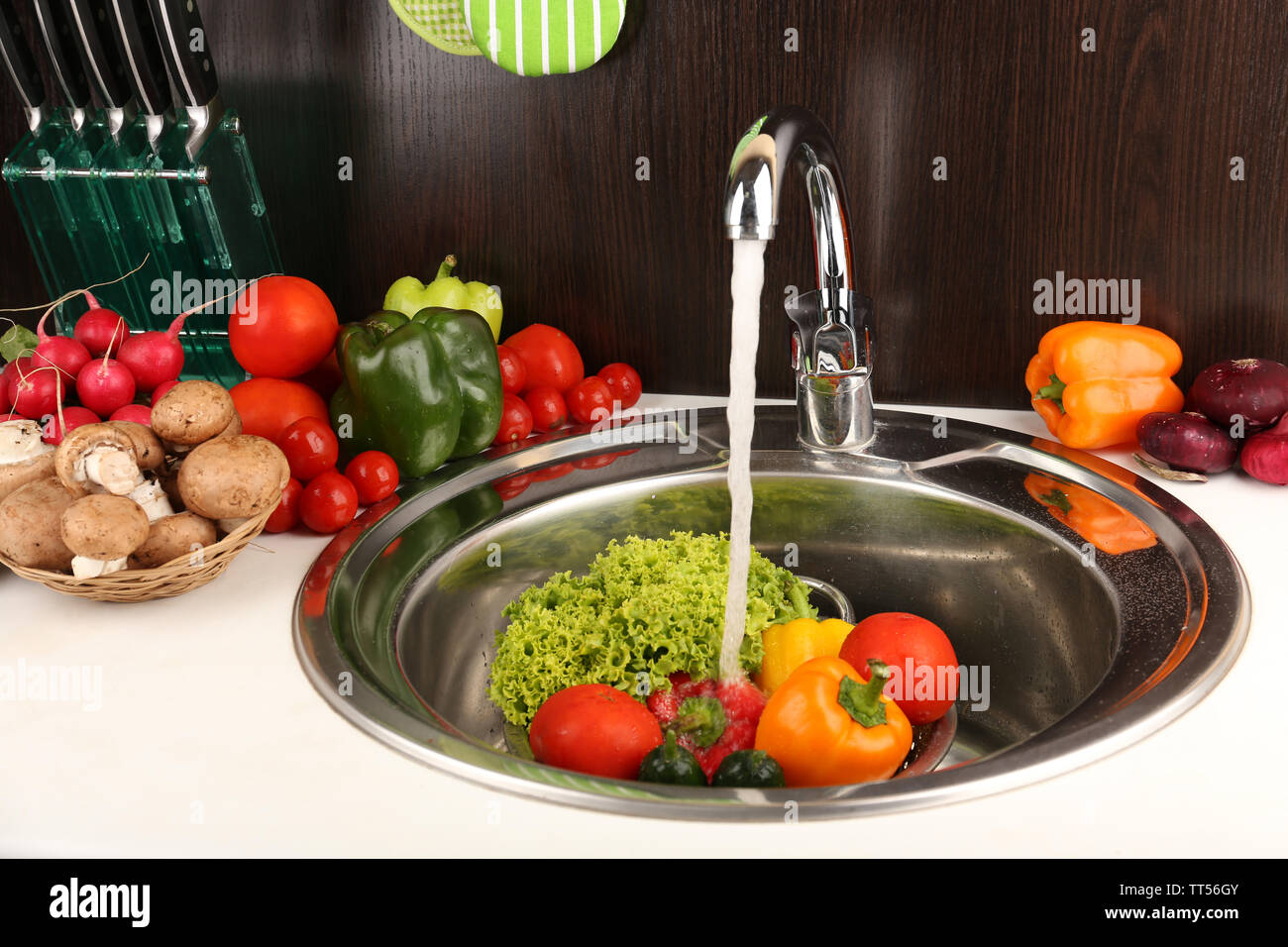 Fresh vegetables in sink in kitchen Stock Photo - Alamy