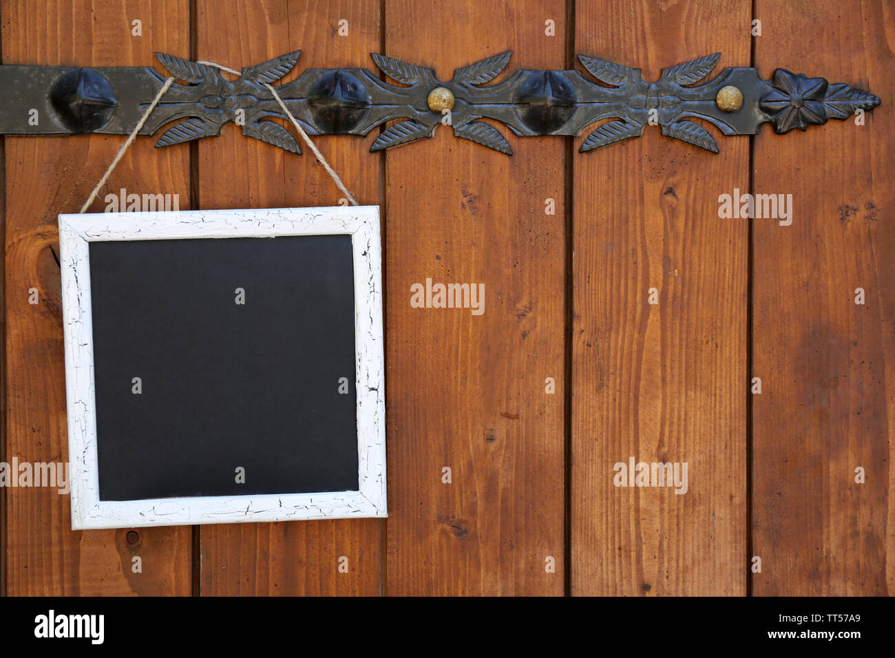 Signboard hanging on wooden fence Stock Photo - Alamy