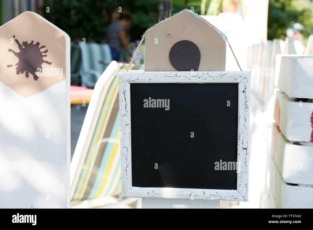 Signboard hanging on wooden fence Stock Photo - Alamy