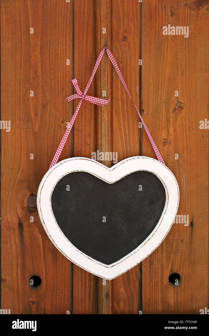 Signboard hanging on wooden fence Stock Photo - Alamy