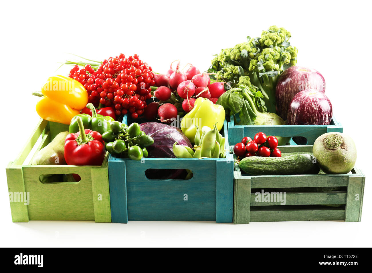 Fresh organic vegetables in wooden boxes, close up Stock Photo - Alamy