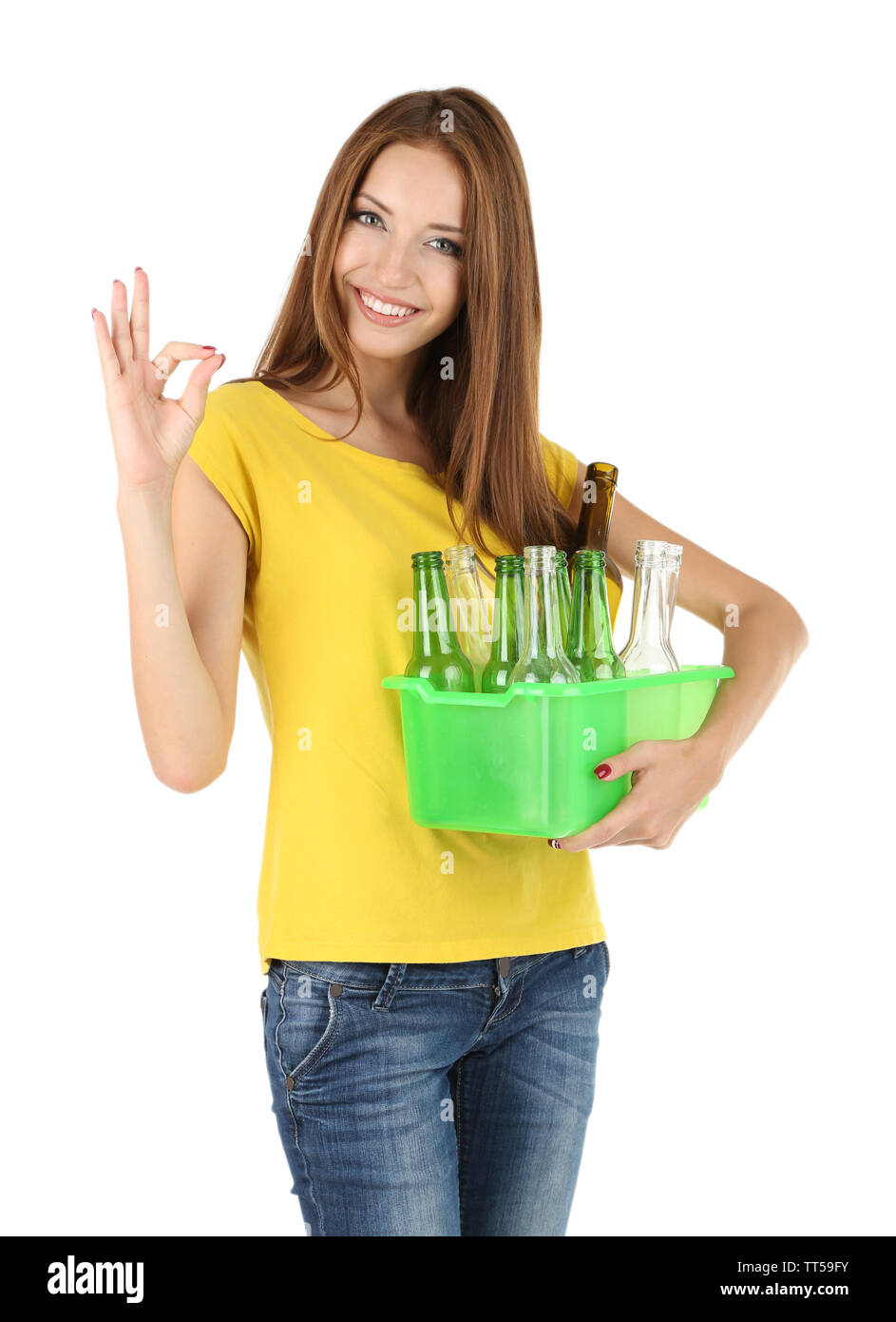 Young girl sorting glass bottles isolated on white Stock Photo - Alamy