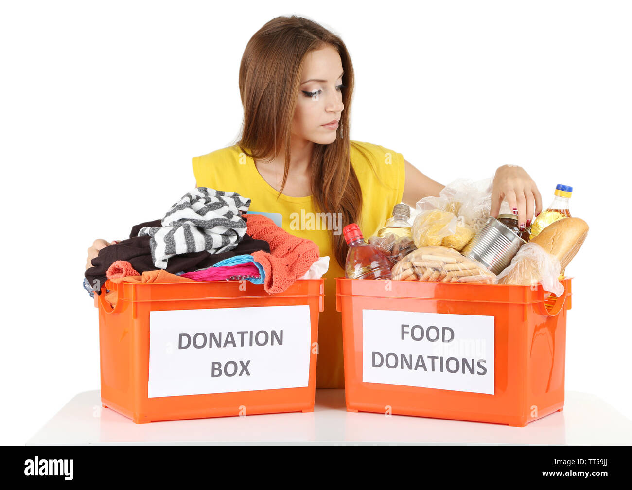 Girl volunteer with donation box isolated on white Stock Photo - Alamy