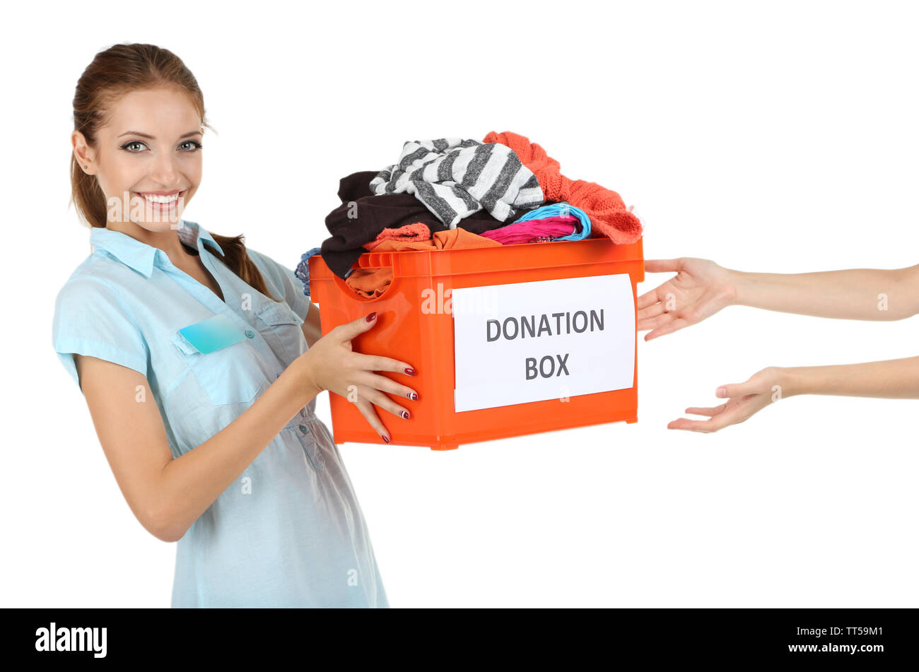 Girl volunteer with donation box isolated on white Stock Photo - Alamy