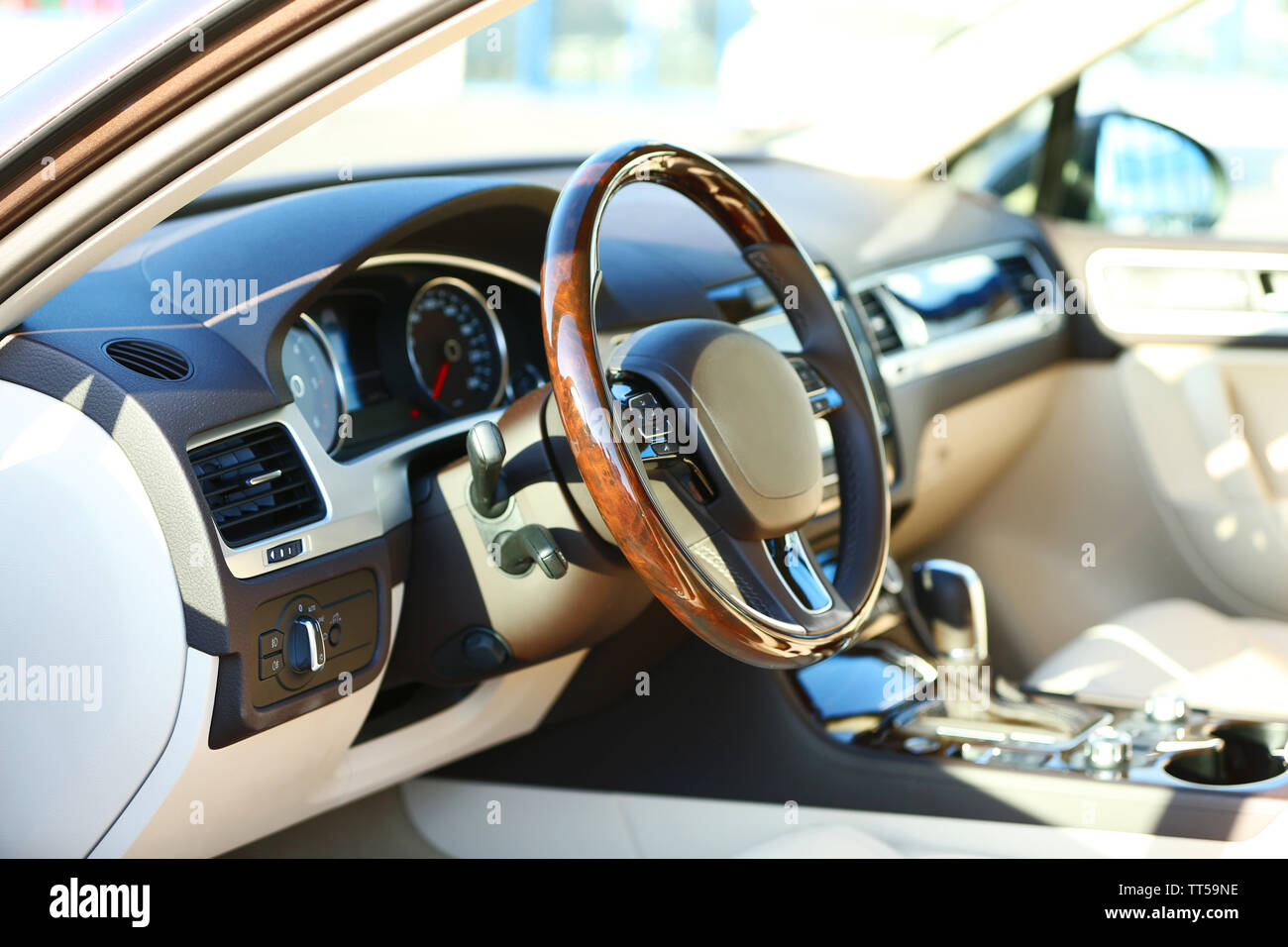 Interior view of car with beige salon and black dashboard Stock Photo ...
