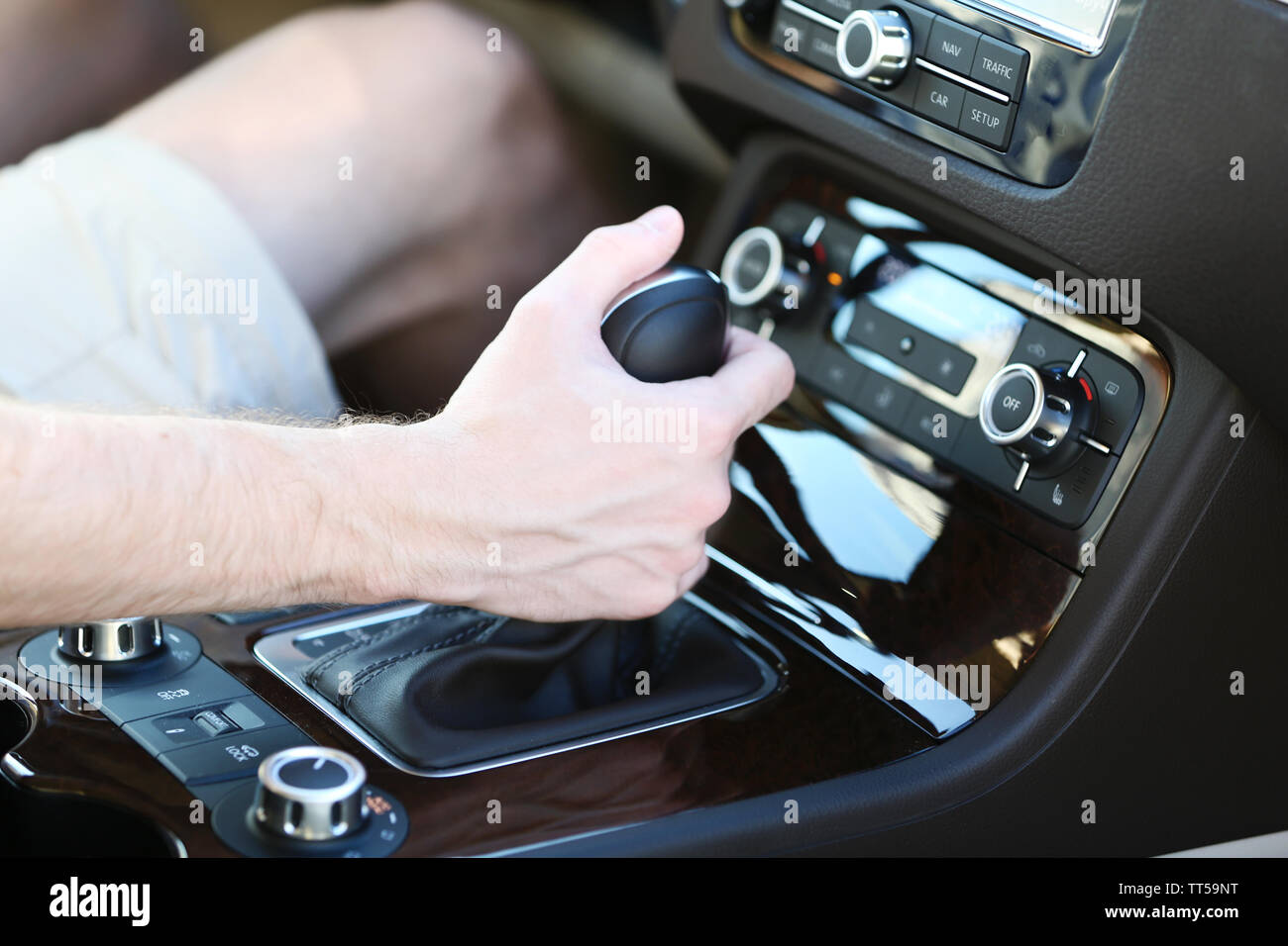 Mans hand drive gear hi-res stock photography and images - Alamy