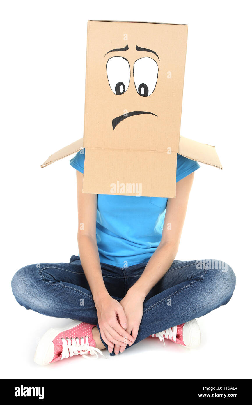 Woman with cardboard box on her head with sad face, isolated on white ...