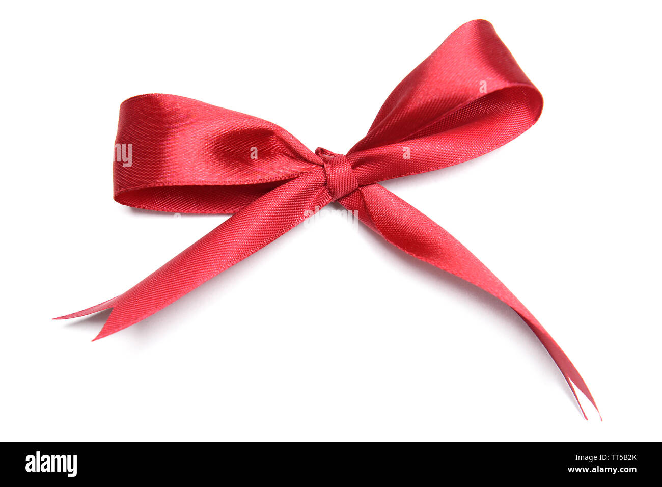 Shiny red ribbon with bow isolated on white Stock Photo - Alamy