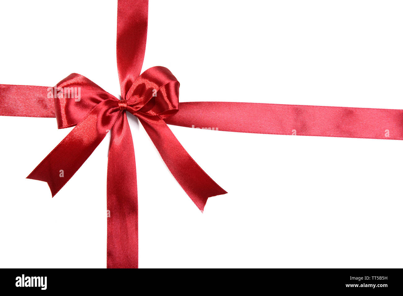 Shiny red ribbon with bow isolated on white Stock Photo - Alamy