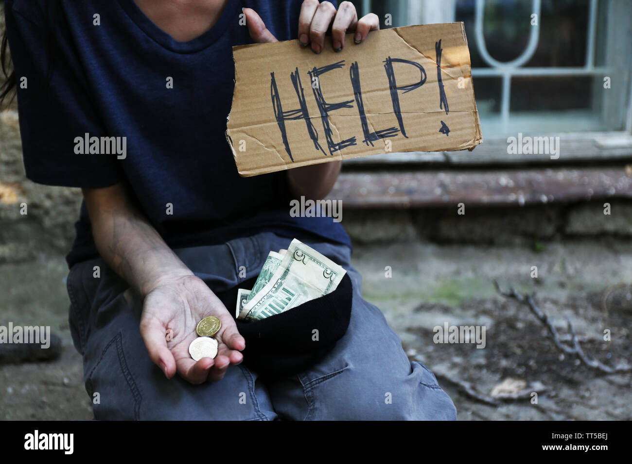 Homeless beggar money Stock Photo - Alamy