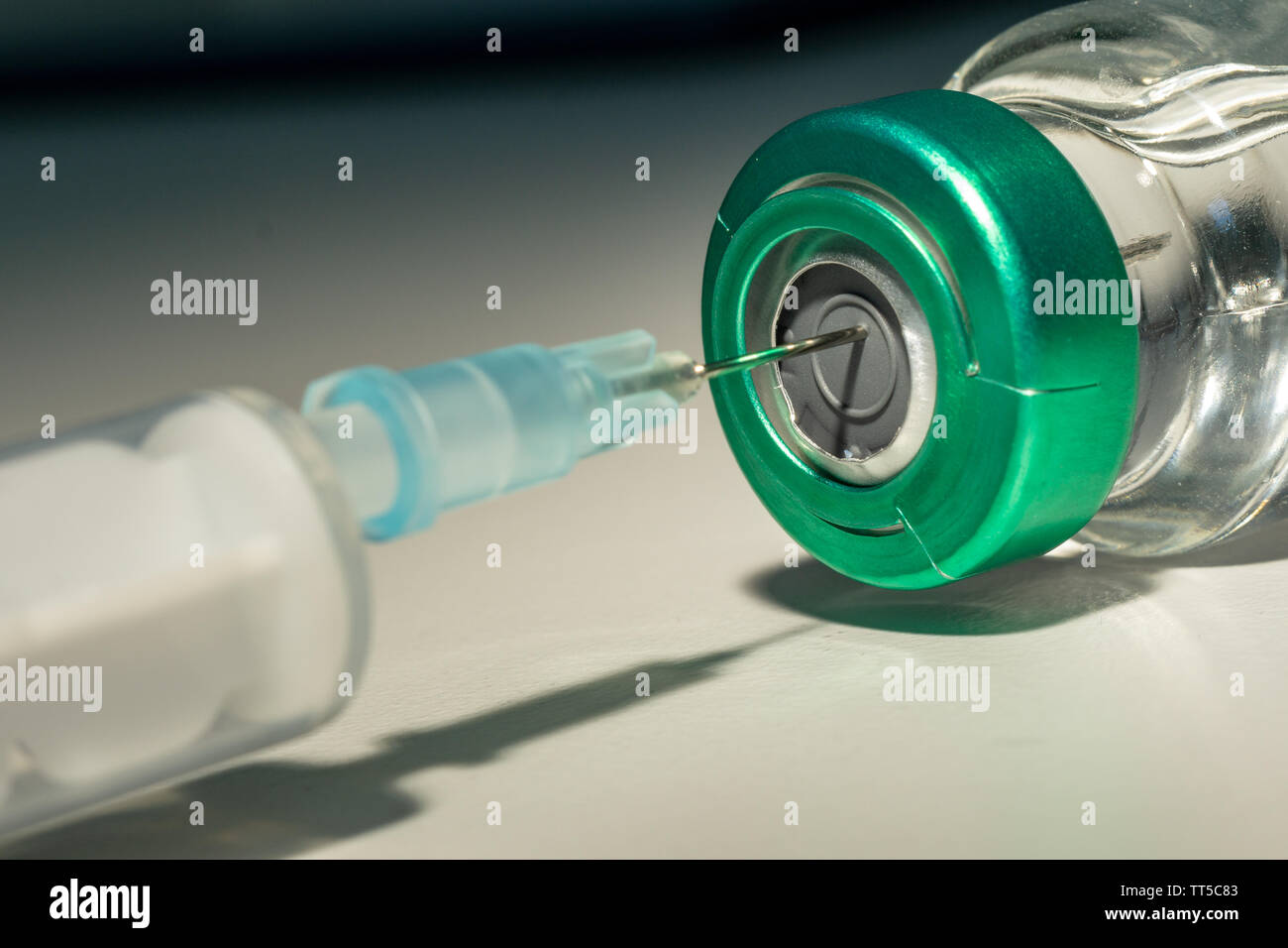 syringe needle in a vial - medical injection or therapy Stock Photo - Alamy