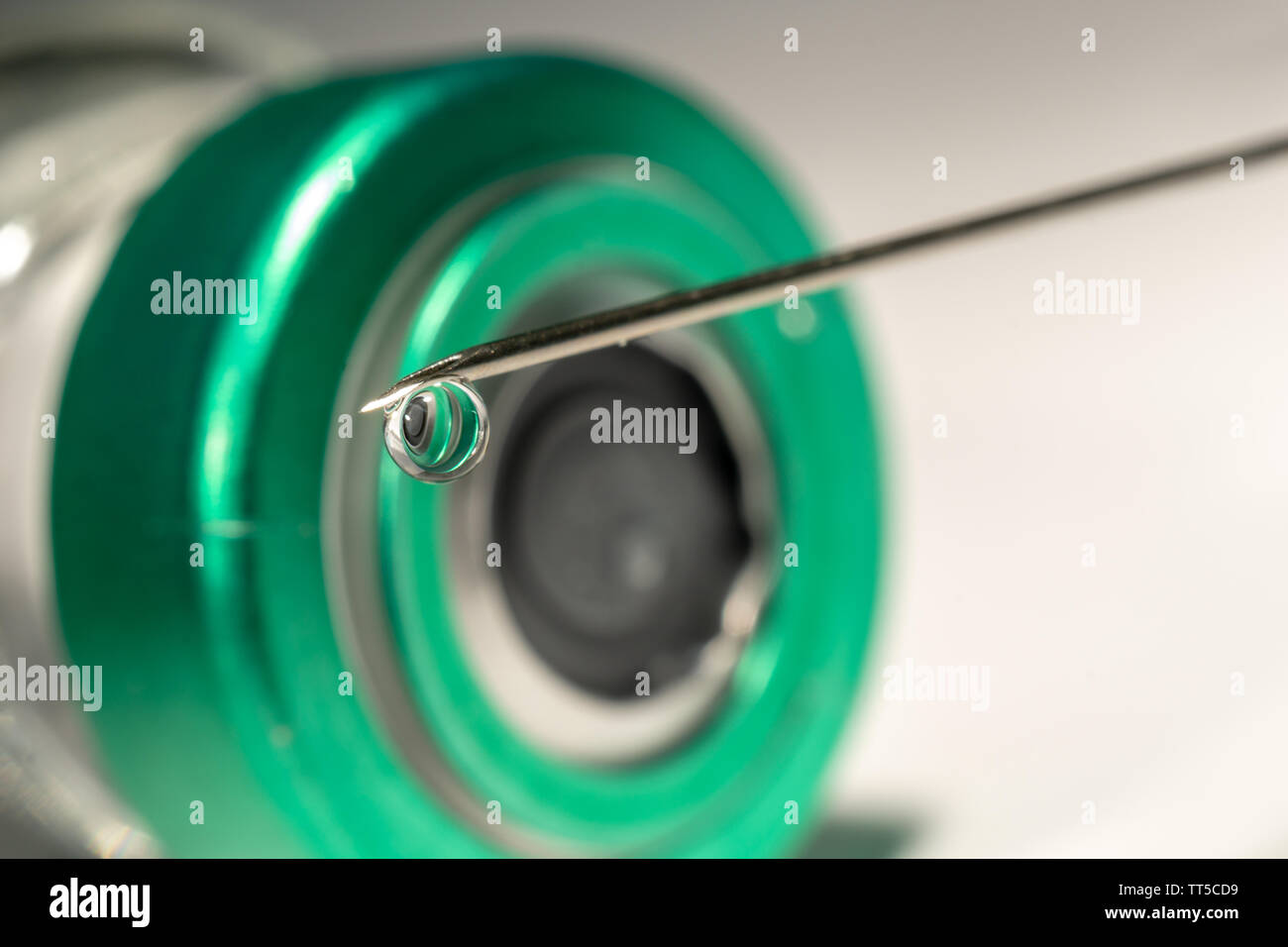 vial and syringe needle with drop of fluid - medical equipment Stock ...