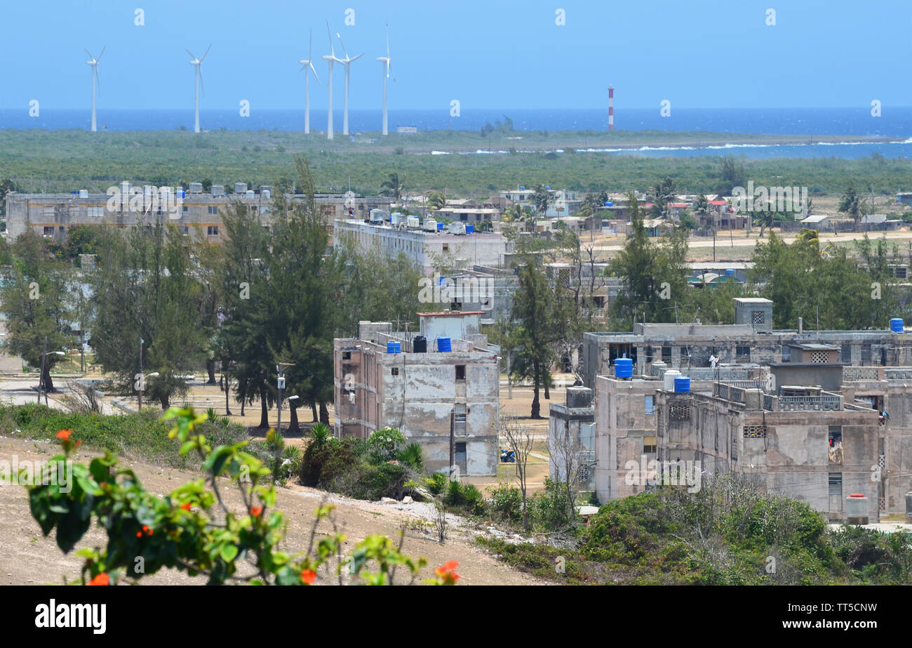 Derelict buildings and concrete apartment blocks in Gibara, Southern ...