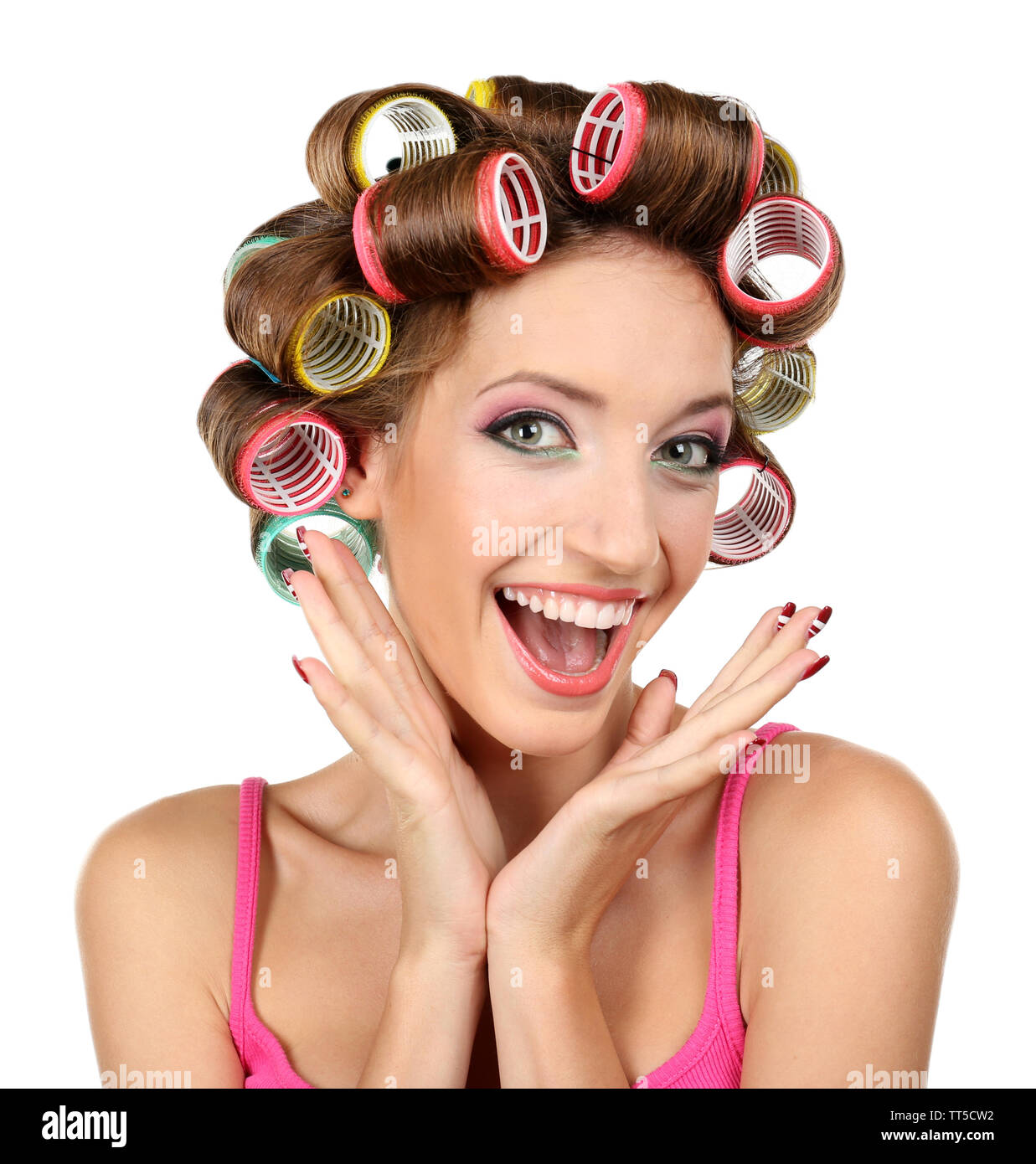 Beautiful girl in hair curlers isolated on white Stock Photo - Alamy