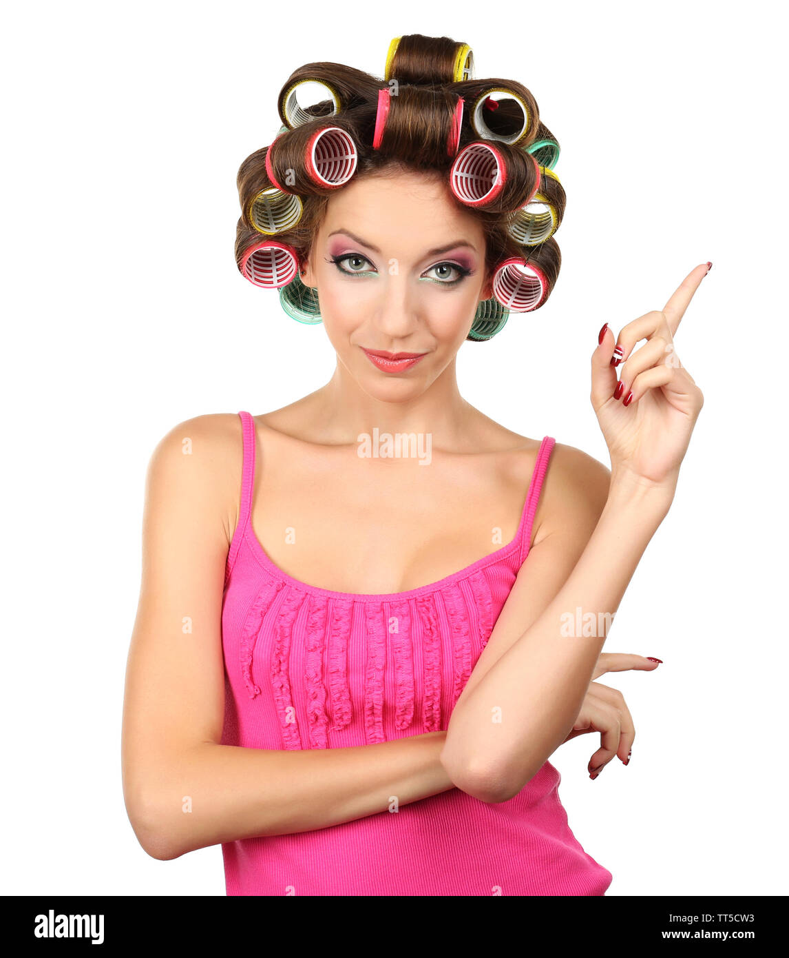 Beautiful girl in hair curlers isolated on white Stock Photo - Alamy