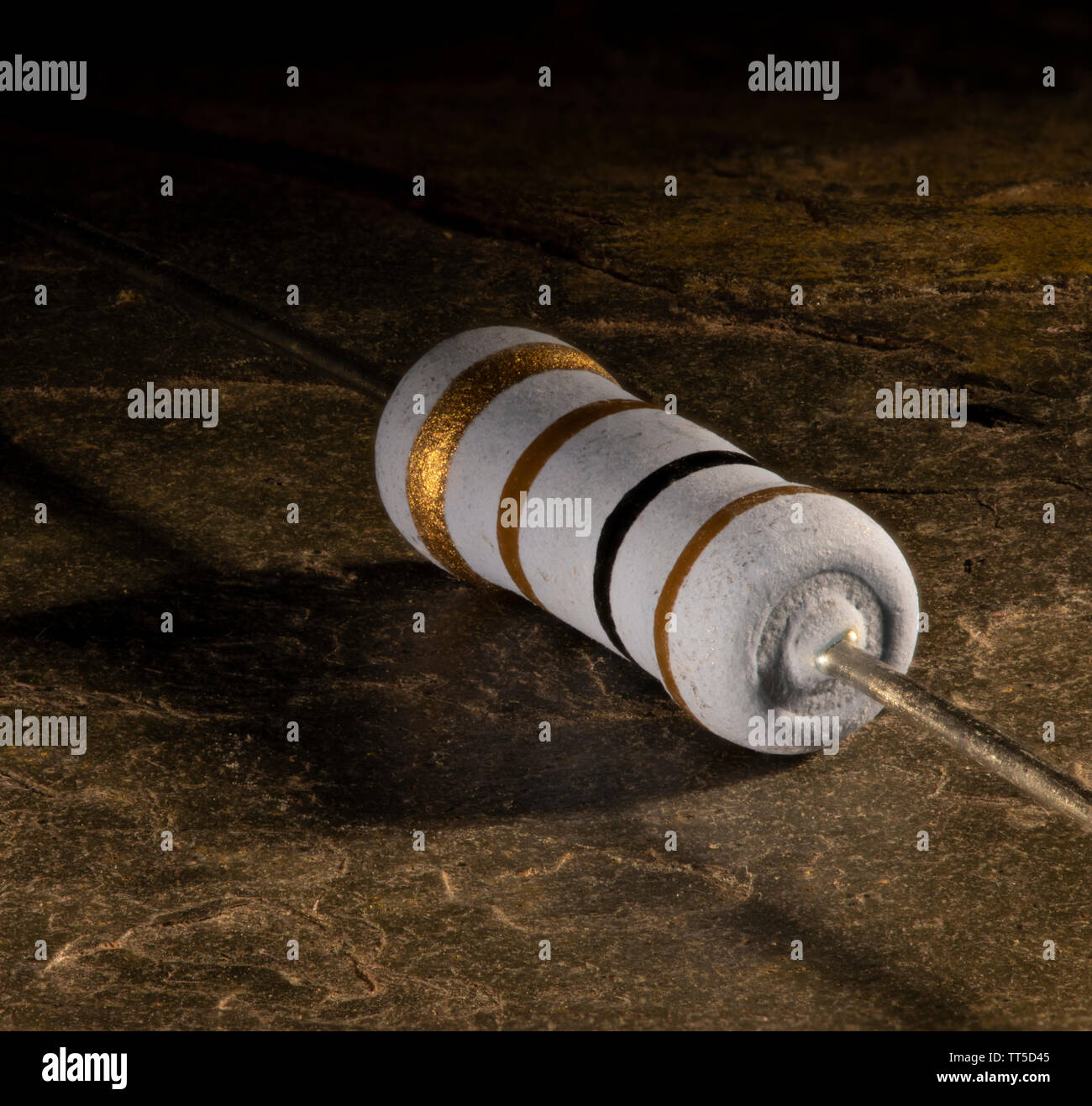 Resistor that is 100 ohms on a stone background Stock Photo - Alamy