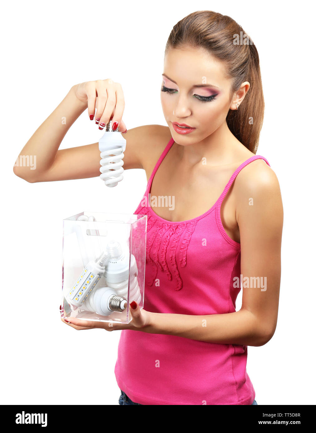 Young girl sorting lamps isolated on white Stock Photo - Alamy