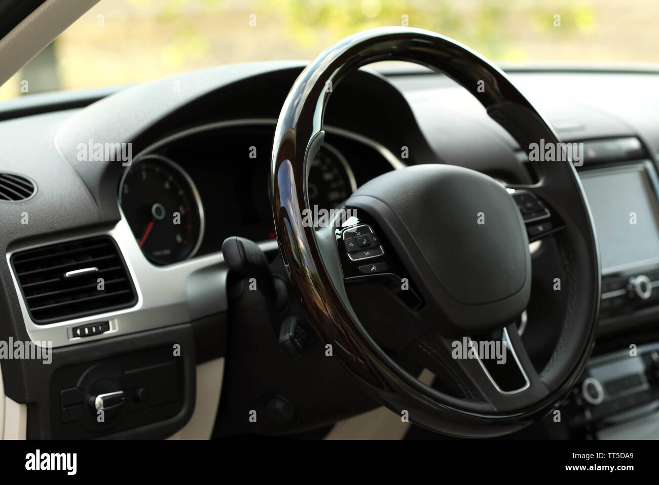 Modern car interior. Steering wheel, close-up Stock Photo - Alamy