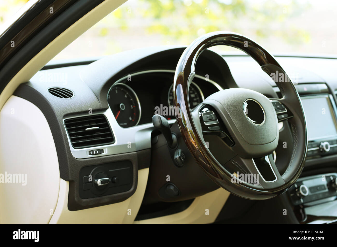 Modern car interior. Steering wheel, close-up Stock Photo - Alamy
