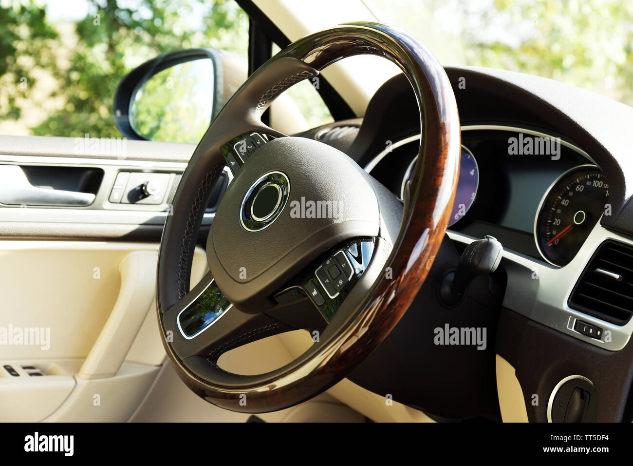 Modern car interior. Steering wheel, close-up Stock Photo - Alamy
