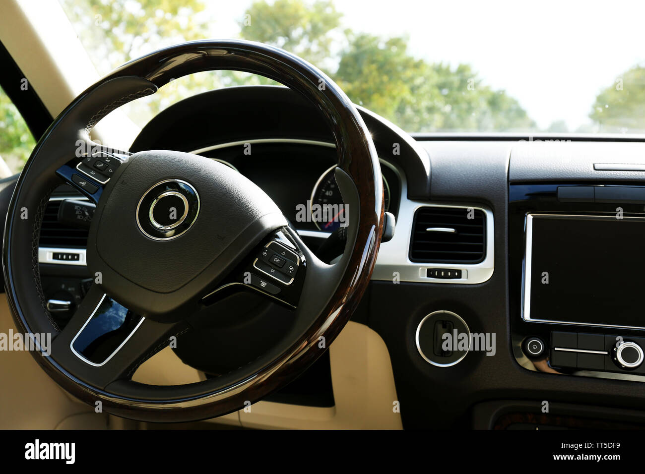Modern car interior. Steering wheel, close-up Stock Photo - Alamy