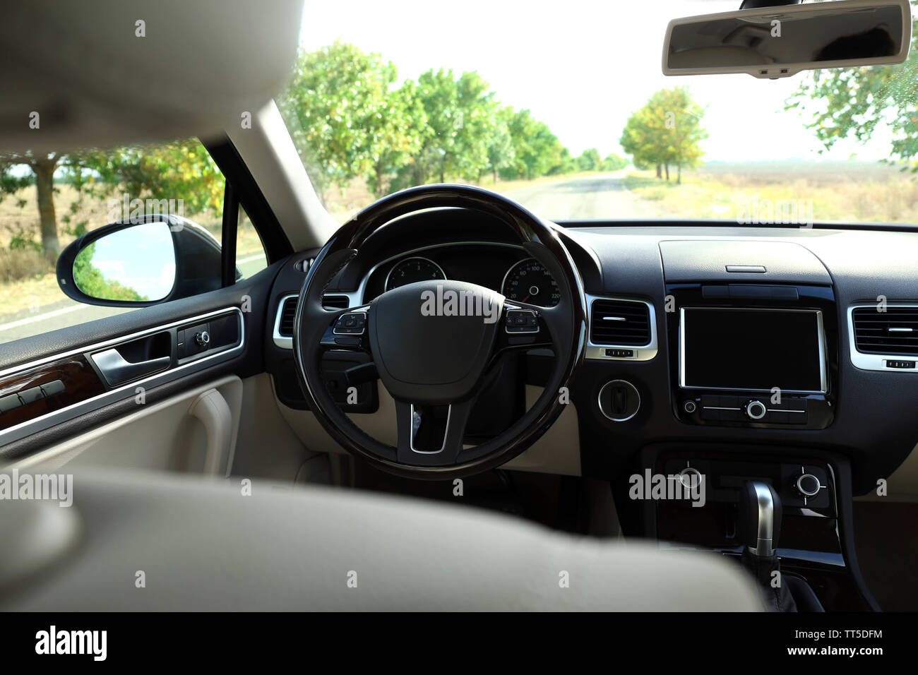 Modern car interior. Steering wheel, close-up Stock Photo - Alamy