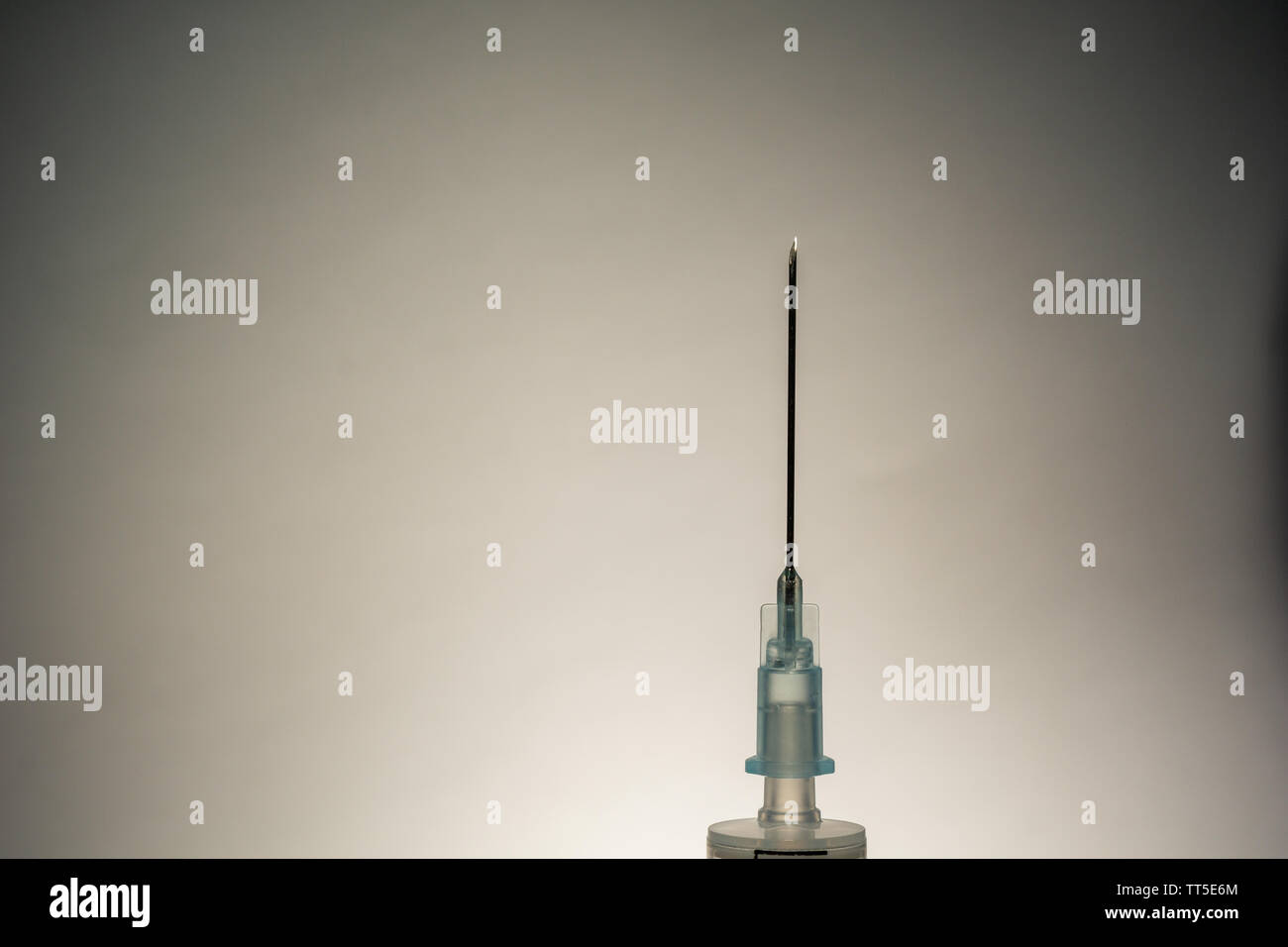 syringe needle on white background Stock Photo - Alamy