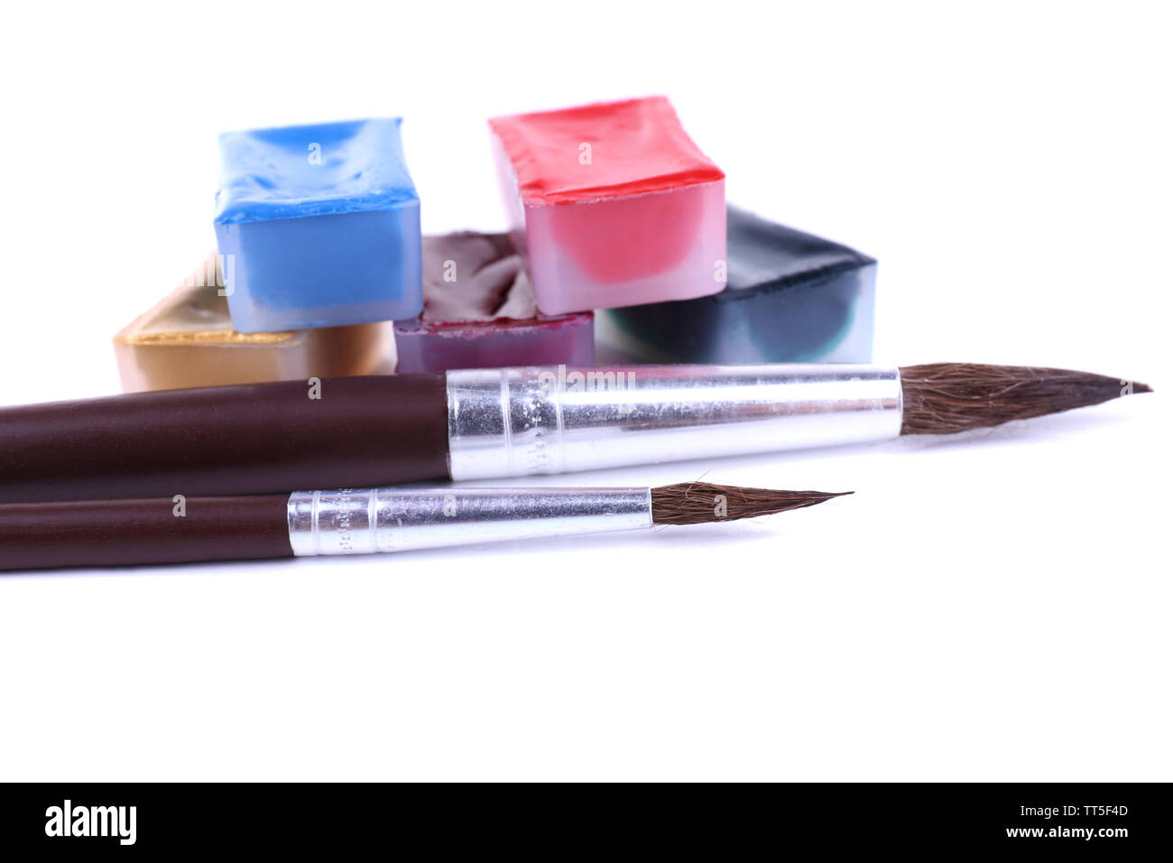 watercolor paint cubes and brushes isolated on white Stock Photo - Alamy