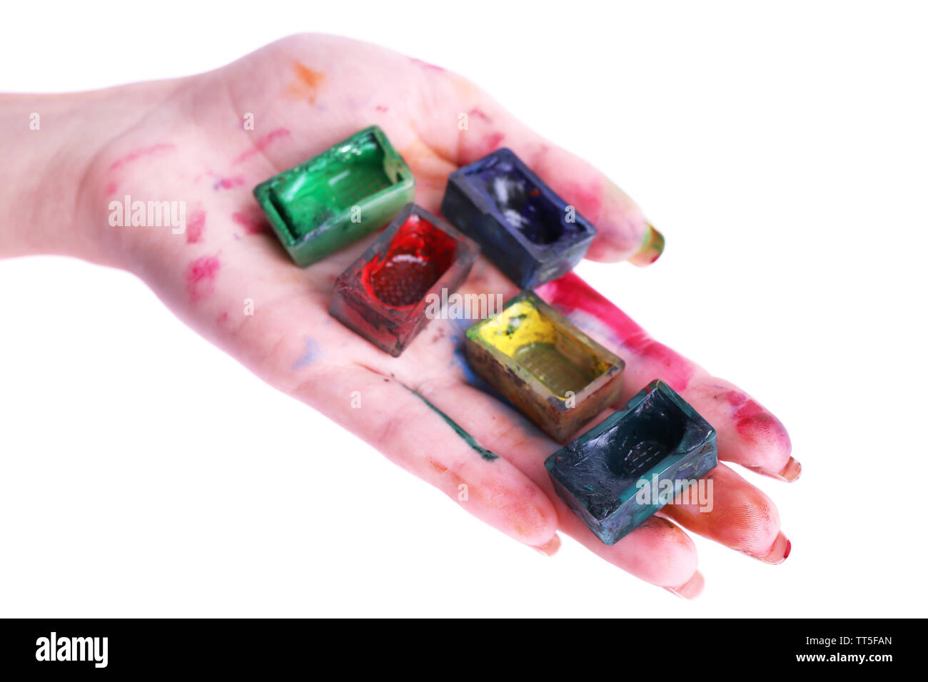 Watercolor paint cubes in female hand isolated on white Stock Photo - Alamy