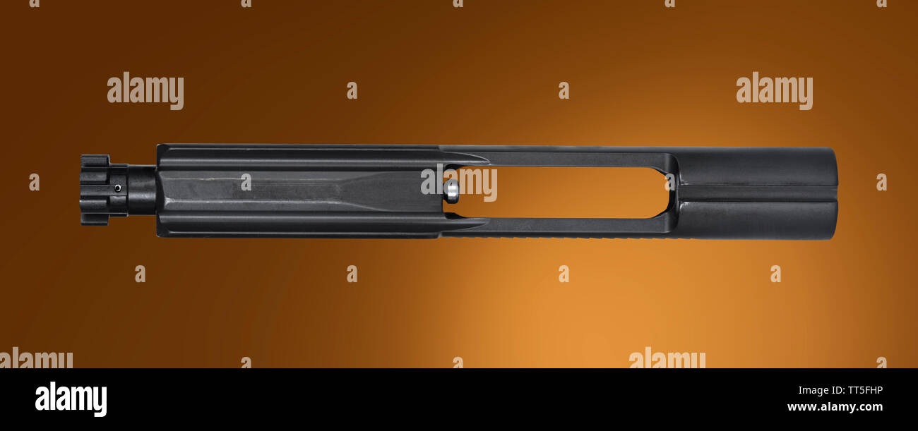 Top of an assault rifle bolt carrier group on a beige background Stock ...