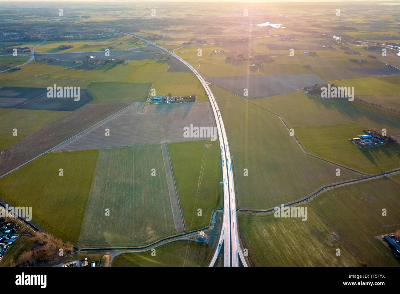 Aerial top view of rural landscape, modern highway road and small farm ...