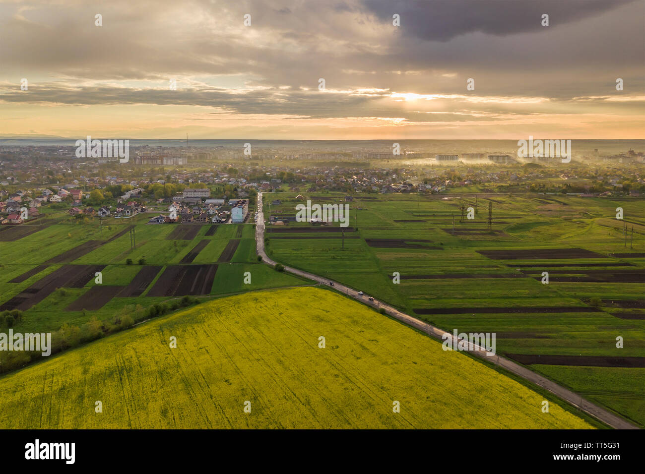 Rural landscape on spring or summer day. Aerial view of green, plowed ...