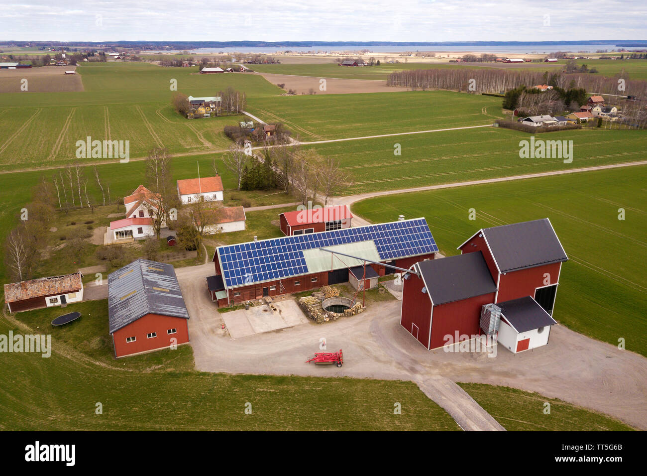 Top view of rural landscape on sunny spring day. Farm with solar photo ...