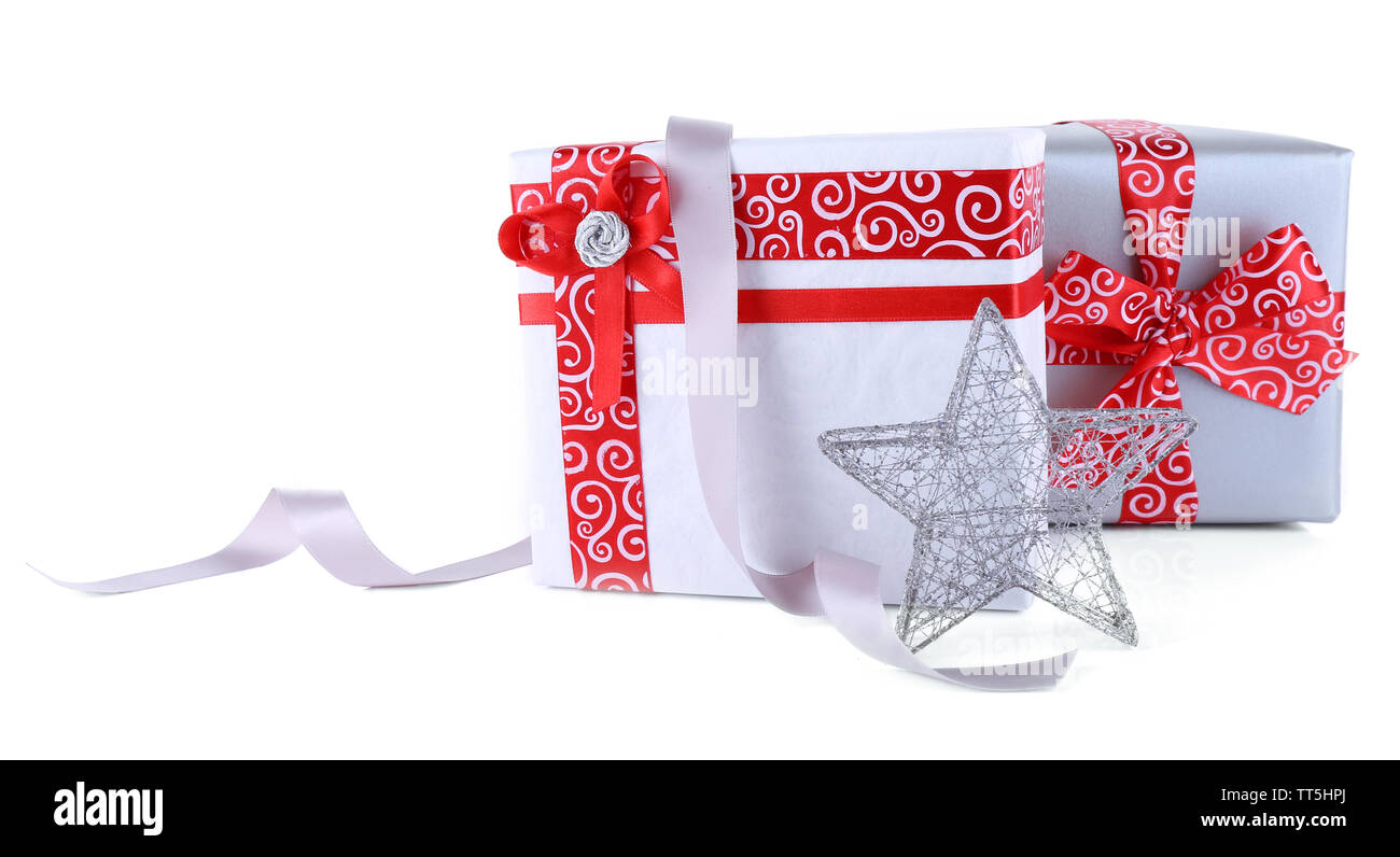 Holiday gift boxes decorated with red ribbon isolated on white Stock ...