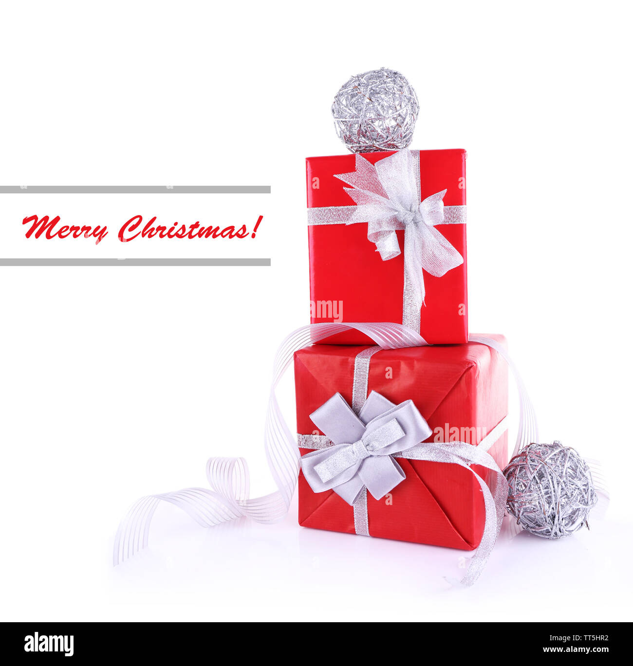 Red holiday gift boxes decorated with ribbon isolated on white Stock ...