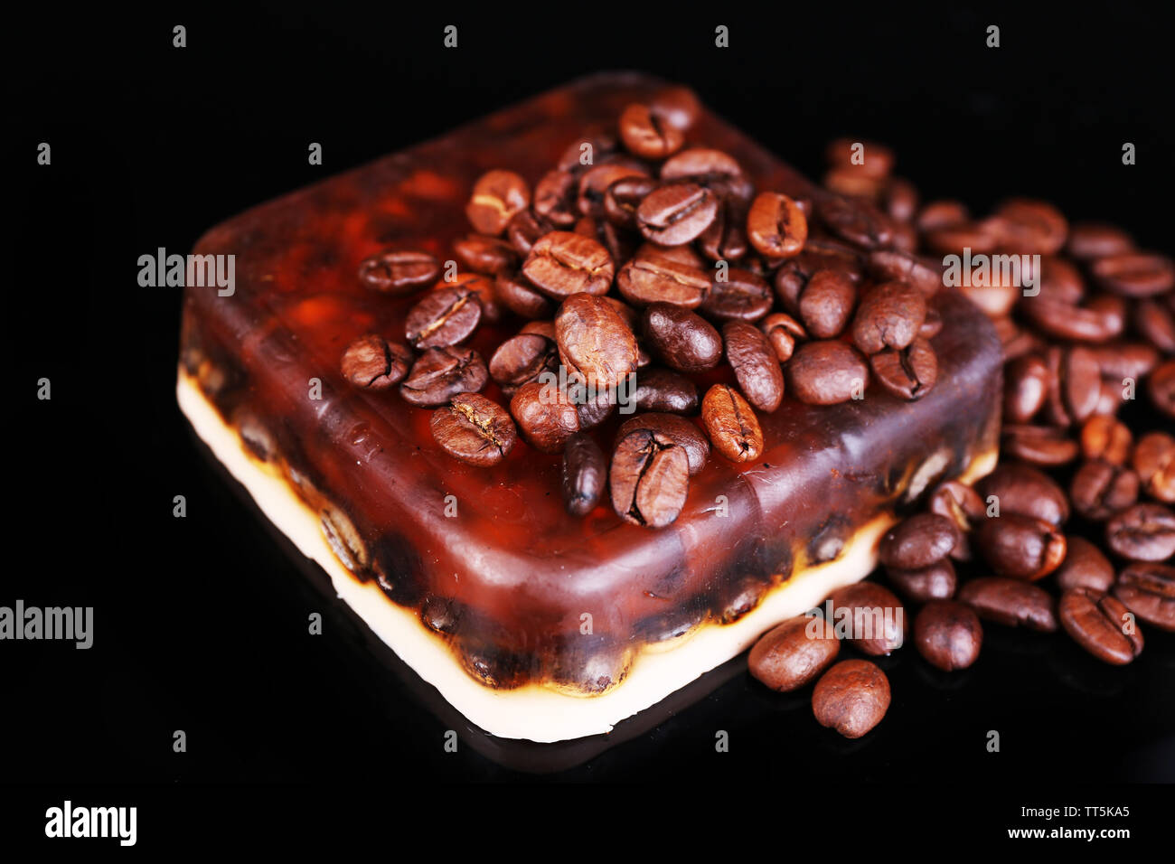 Organic soap with coffee beans, on dark background Stock Photo - Alamy