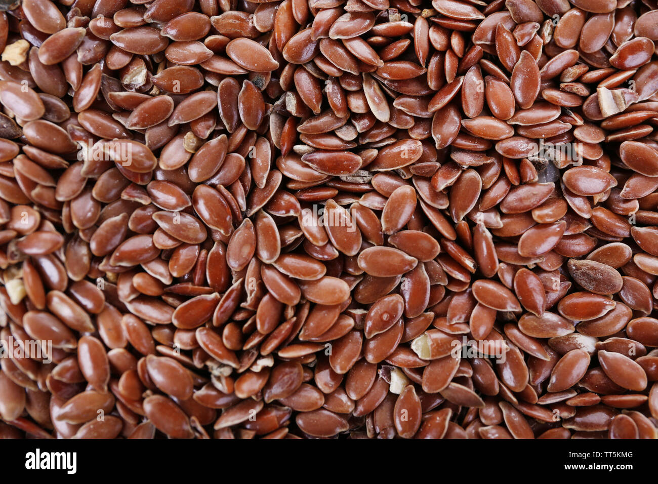 Flax seeds as background Stock Photo - Alamy